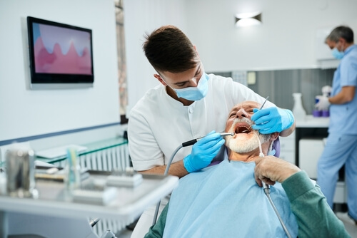 Loose Tooth Stuck to Gum: How to Safely Remove It